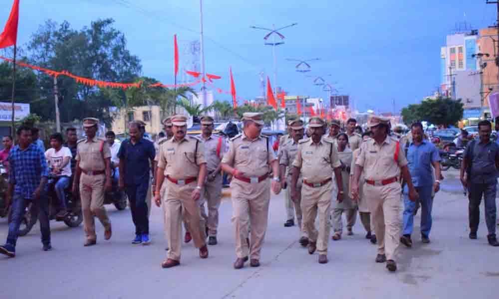 Flag march held in Nirmal town