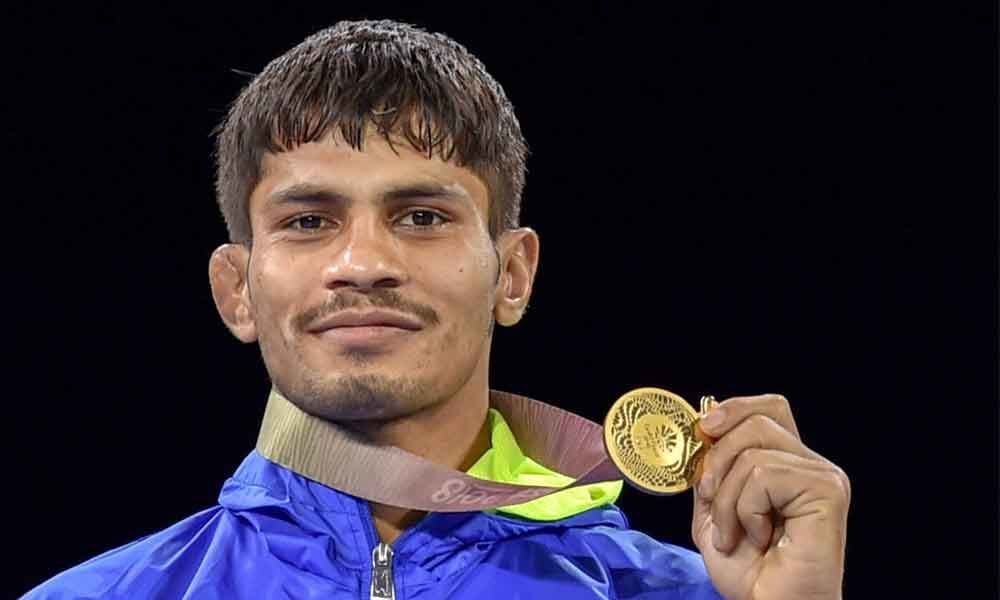Rahul wins bronze, Deepak silver in India's best ever show