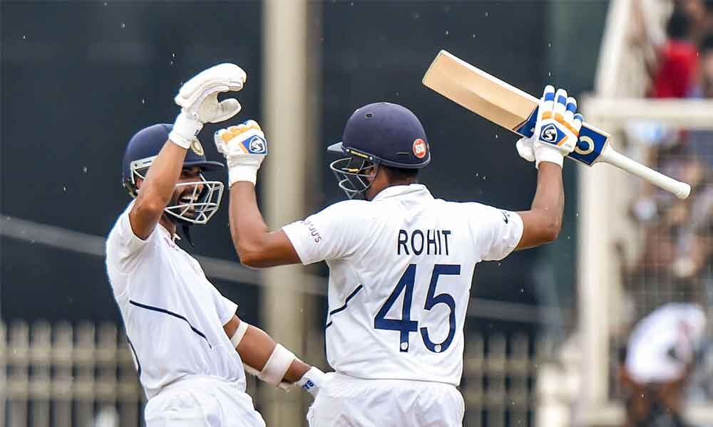Rohit, Rahane steady India's ship