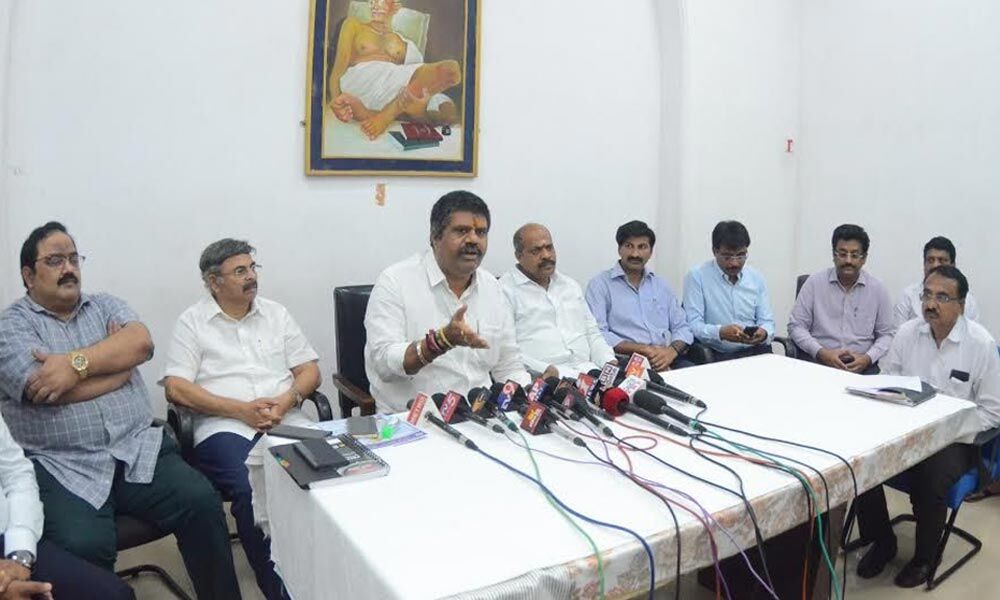 Minister M Srinivasa Rao calls for collective efforts to combat Covid ...