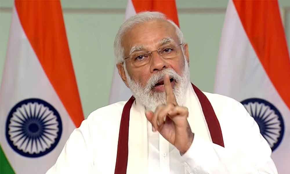 PM Modi defends farm bills
