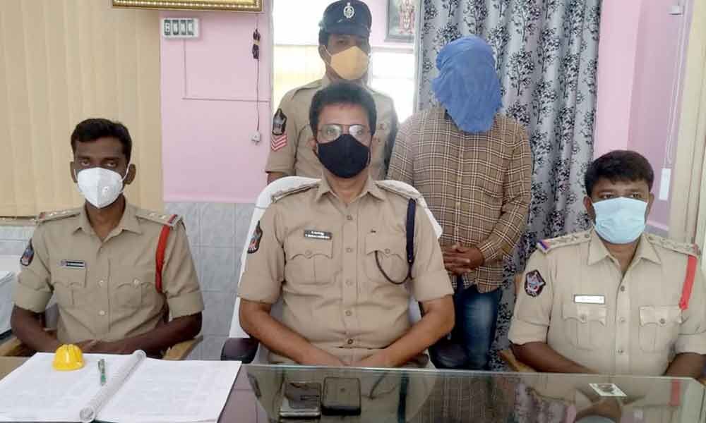 A person arrests by police in forgery records case