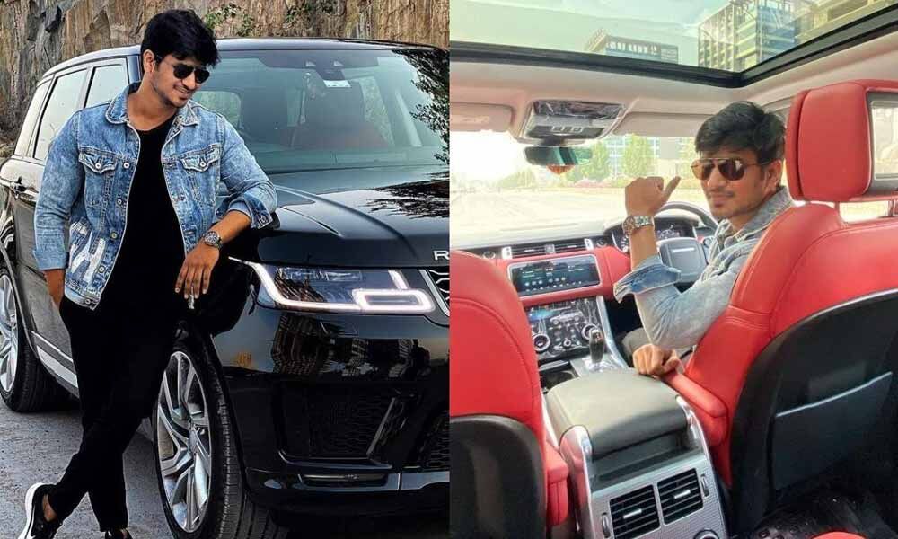 Nikhil poses with his black Rangerover