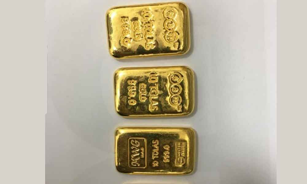 2 held with 1.4 kg gold at RGIA