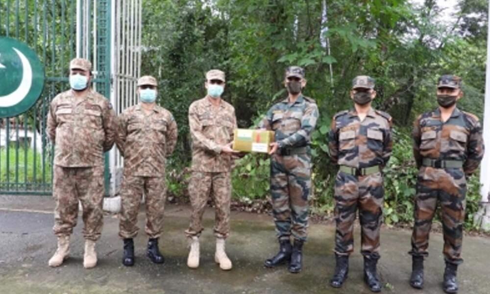 India, Pakistan armies share sweets at Line of Control on Eid