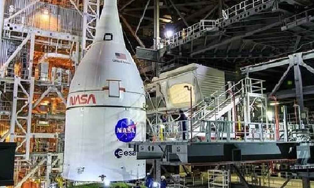 NASA completes stacking rocket for Moon mission