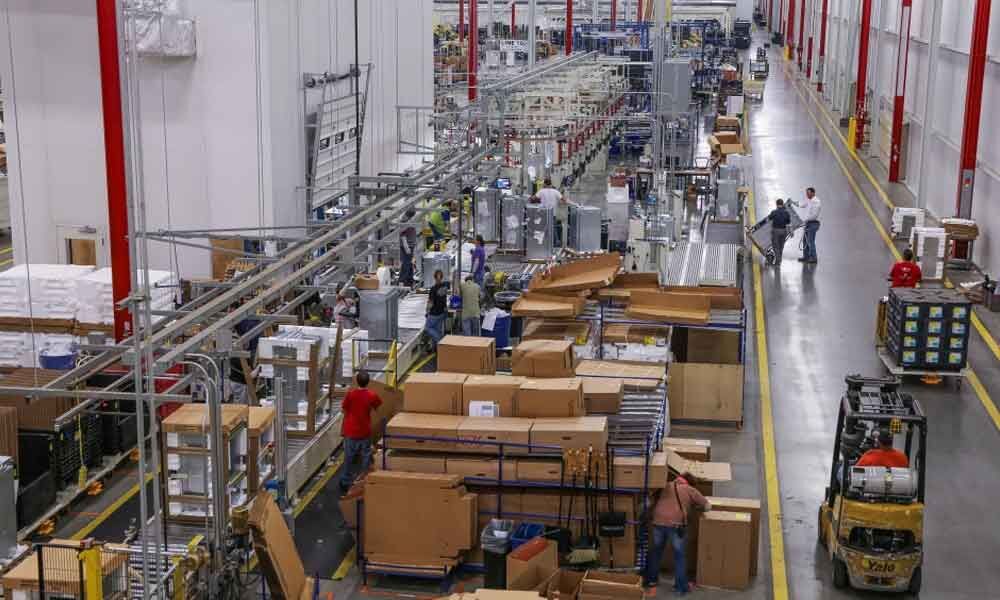 Rise in new orders boosts factory output