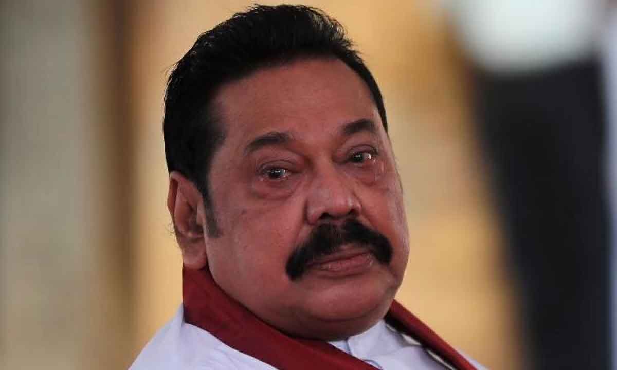 Rajapaksa flees to naval base