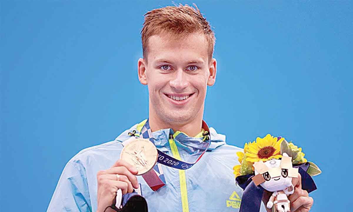 Romanchuk wins medal in pool while father fights in Ukraine