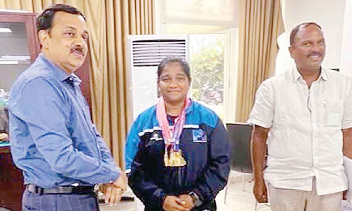 Spl CS Rajat Bhargava felicitates powerlifter Chandrakala