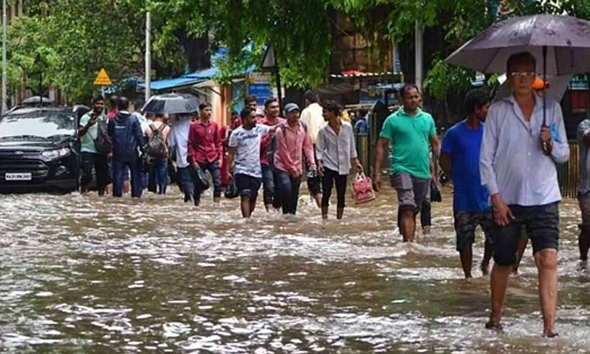 Heavy rains continue unabated in Mumbai, local trains delayed; more ...