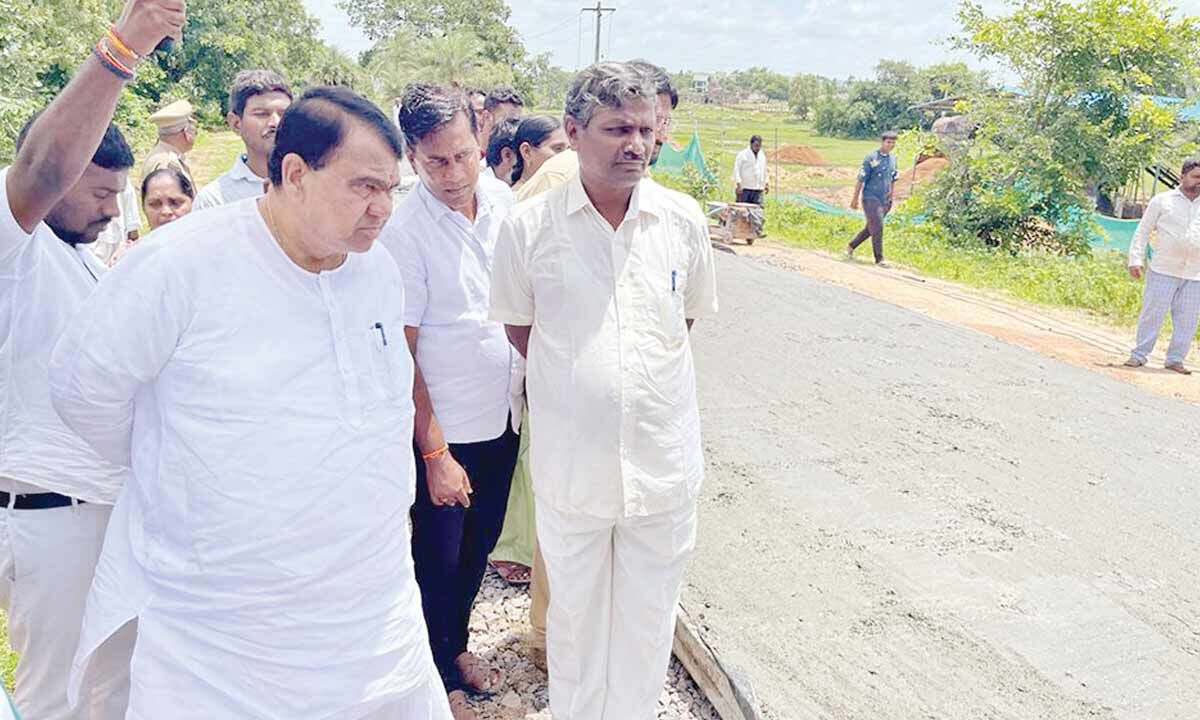 Speaker Pocharam Srinivas Reddy inspects CC road works in Kamareddy