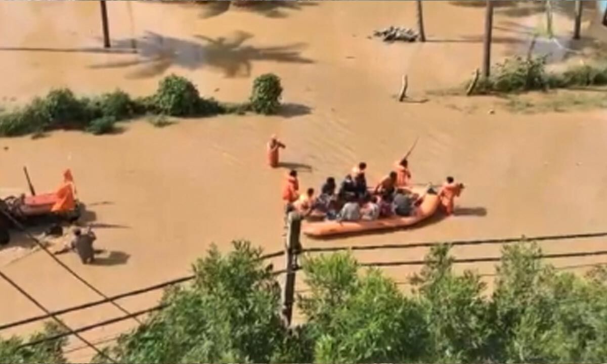 Boats in Bengaluru roads after heavy downpour; CM Bommai says SDRF ...