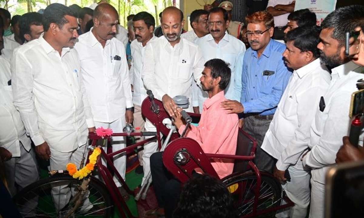 Bandi Sanjay Kumar distributes equipment to disabled