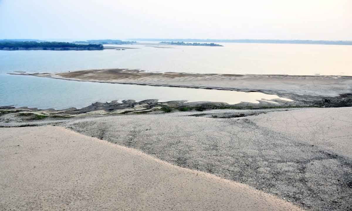 Sand dunes appearing in waterless Godavari river
