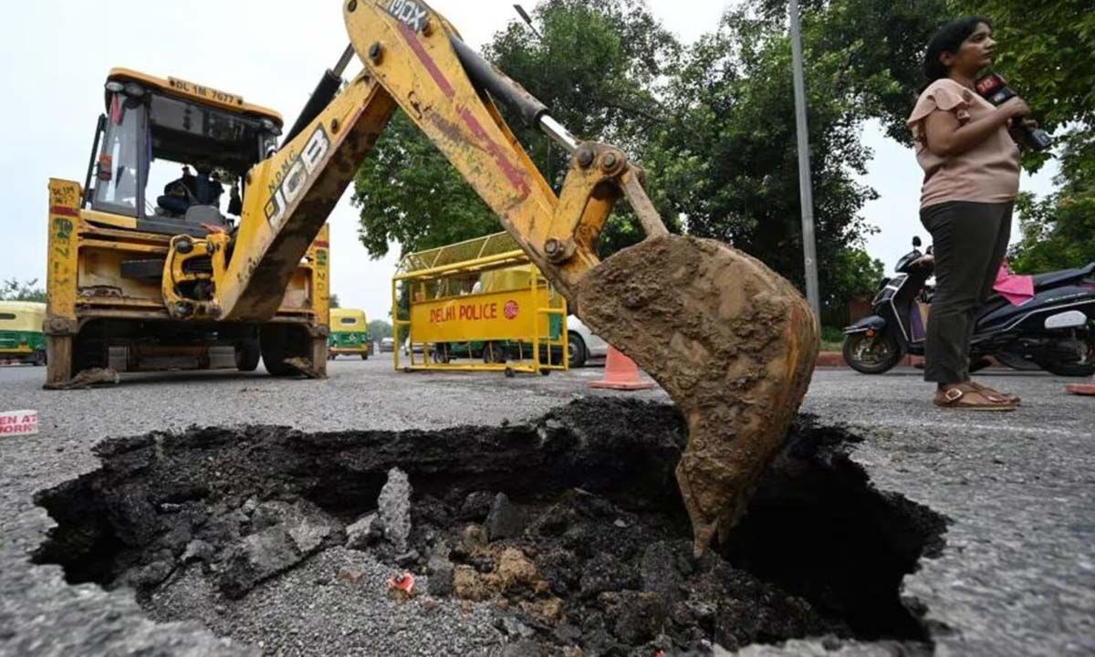 Road caves in near India Gate in New Delhi