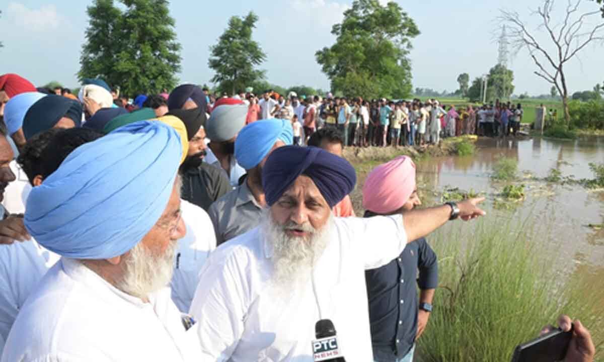 Sukhbir Badal visits flood-hit villages along Pakistan border, blames ...