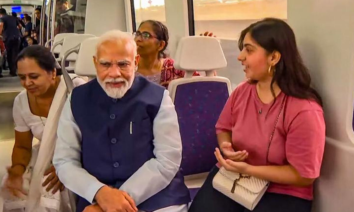 Modi takes metro ride, opens new Airport Line