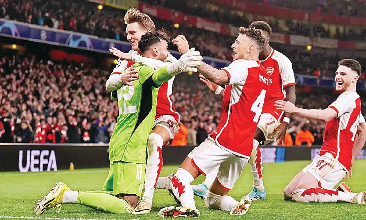 Arsenal, Barca reach Champions League QF