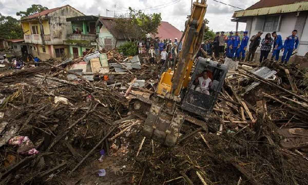 Death toll in Indonesia's floods, volcanic mudflows rises to 52
