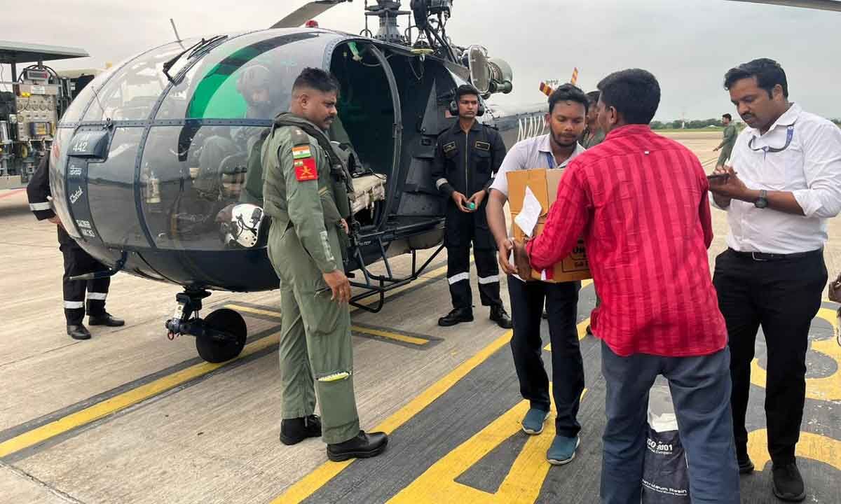 NDRF Supplies Food to Flood Victims in Helicopter