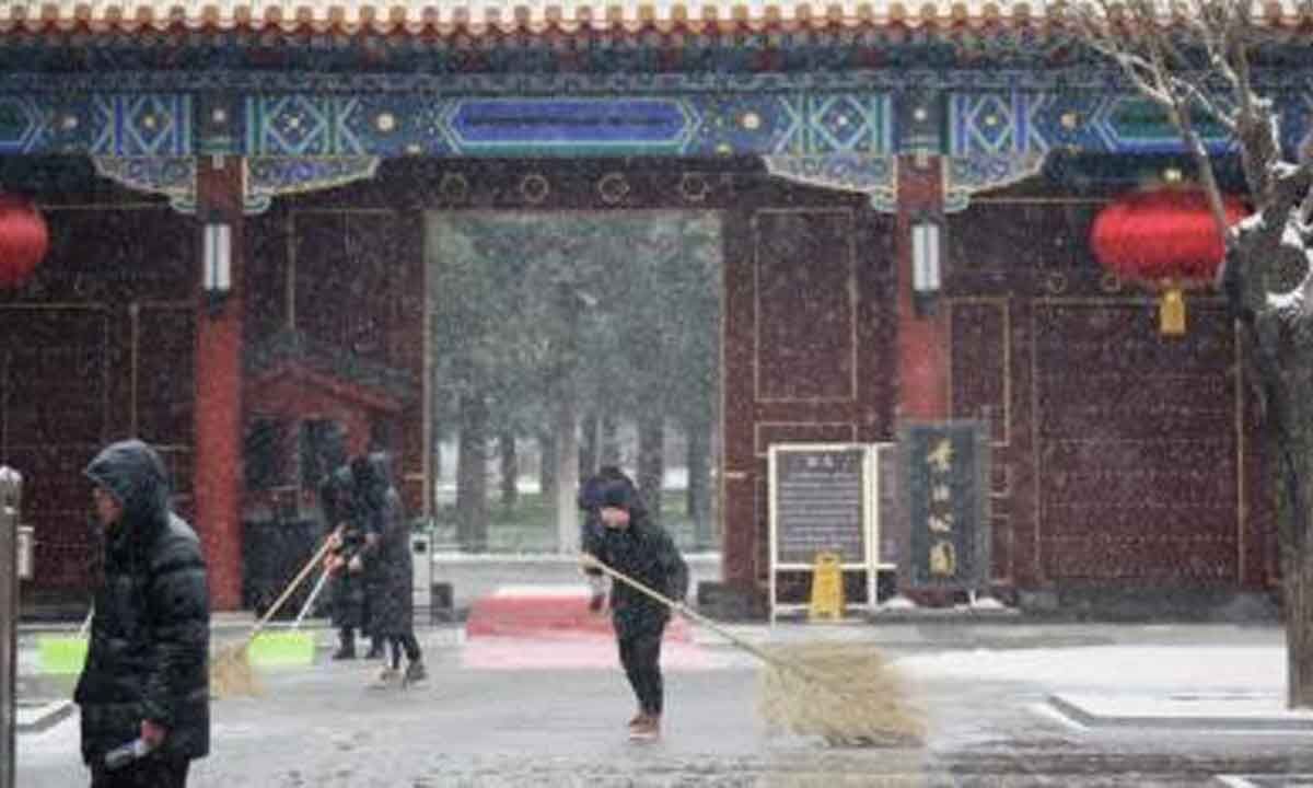 Beijing braces for cold wave, rain, snow