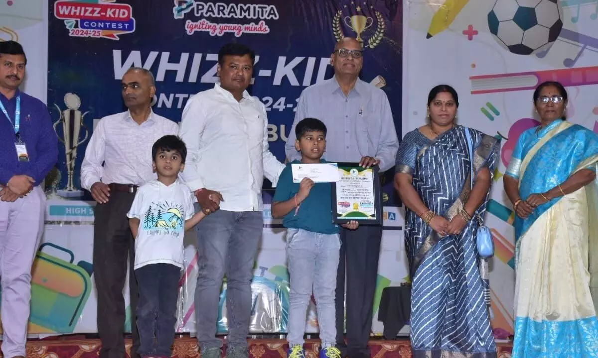 Cash awards presented to winners of Wiz Kid contest