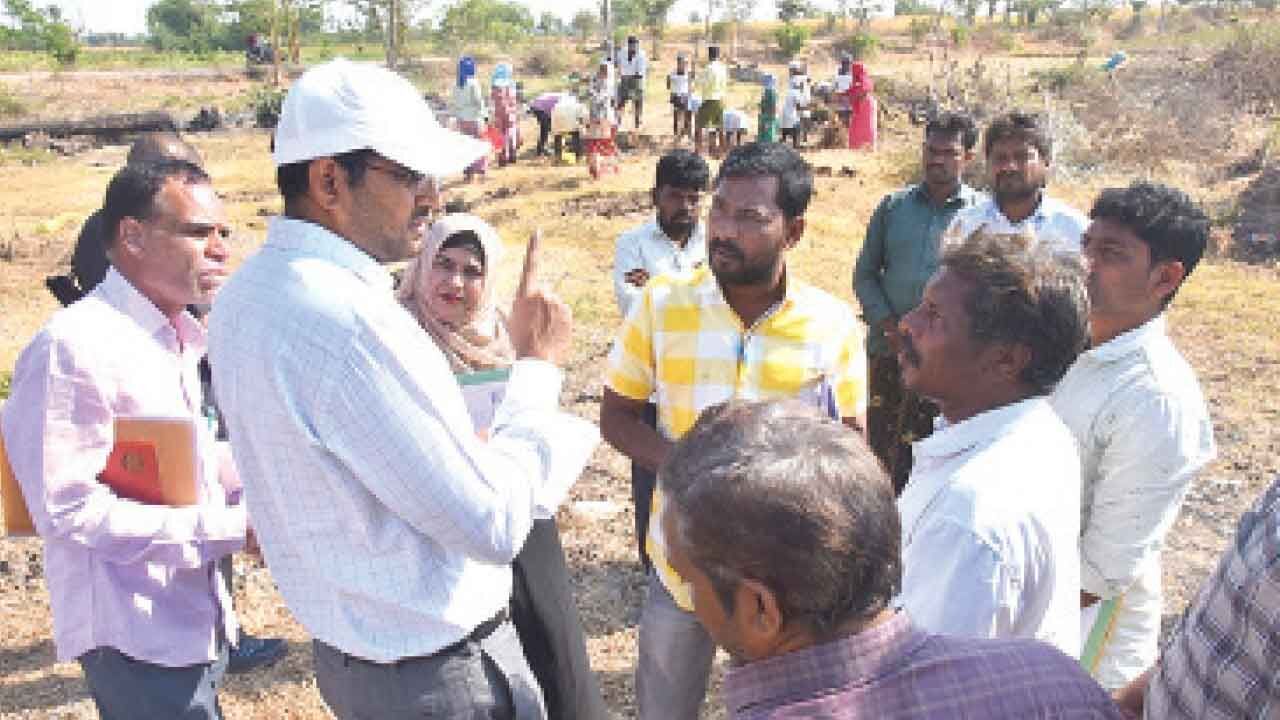 Collector inspects NREGS works