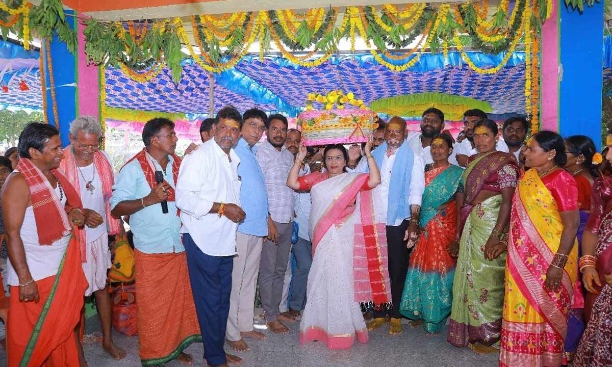 Jhansi Reddy offers bonam to 2 village deities