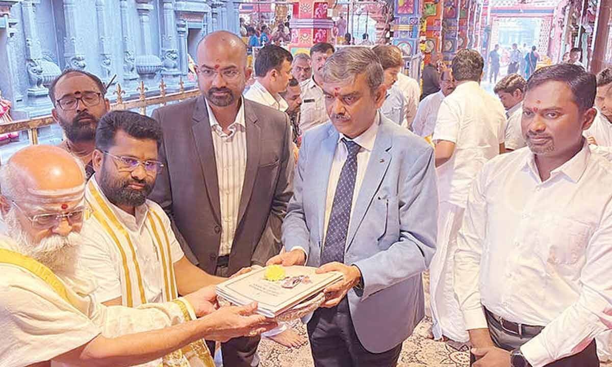 Budget copies placed before Goddess Durga before presentation