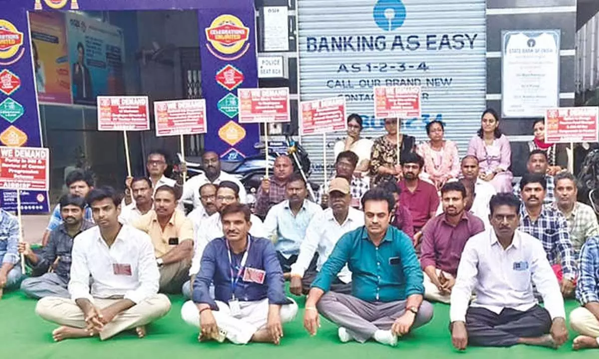 SBI staff stage protest