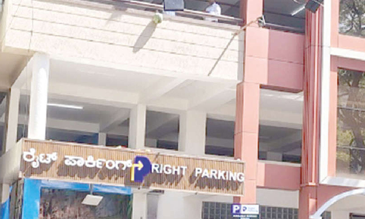 Multi-level parking lot rented out to luxury car showroom?