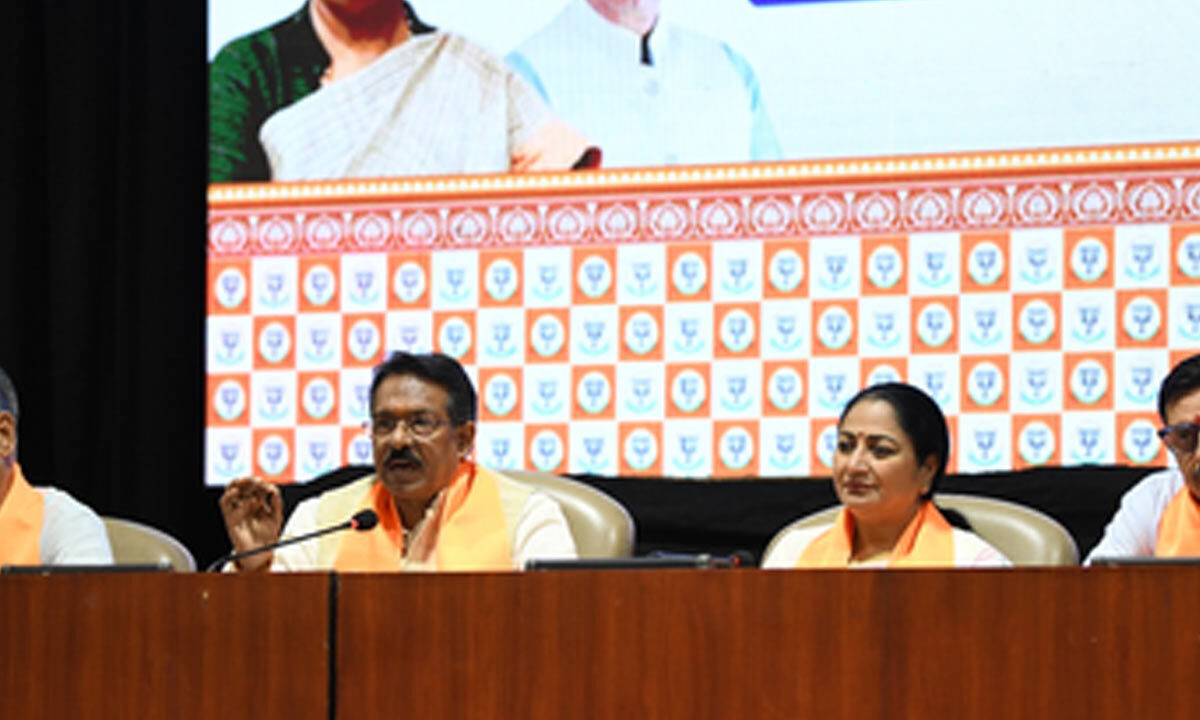 Delhi BJP President meets DU V-C, gives booklet on achievements of PM Modi