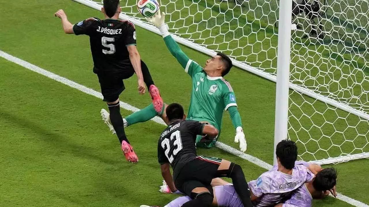 Mexico first to make it to knockout stage