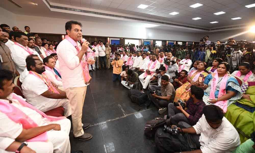KTR hoisting party flag at Telangana Bhavan on 18th TRS Formation Day