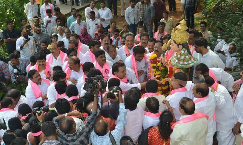 KTR hoisting party flag at Telangana Bhavan on 18th TRS Formation Day